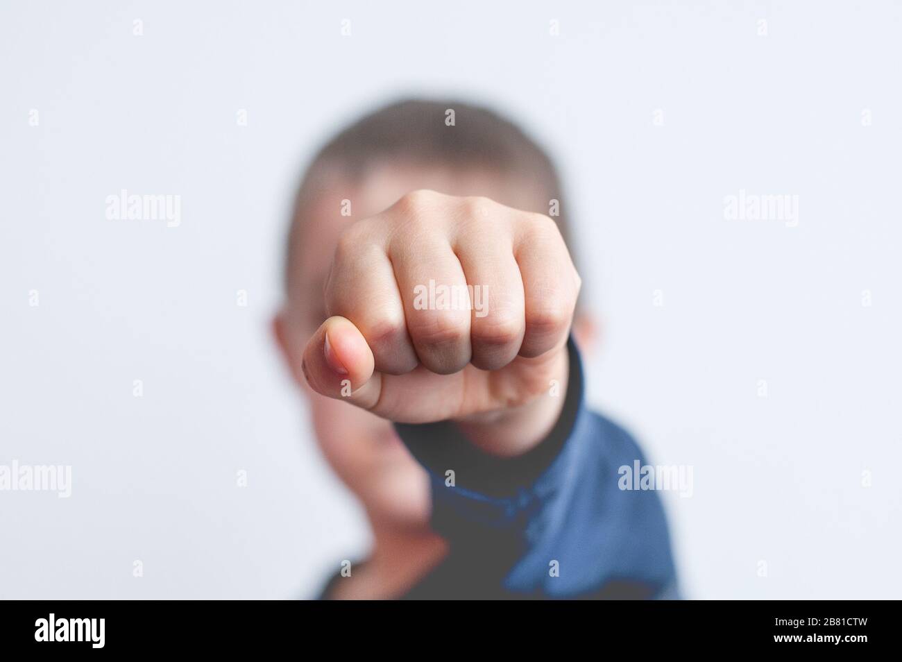 Clenched fist child hi-res stock photography and images - Alamy