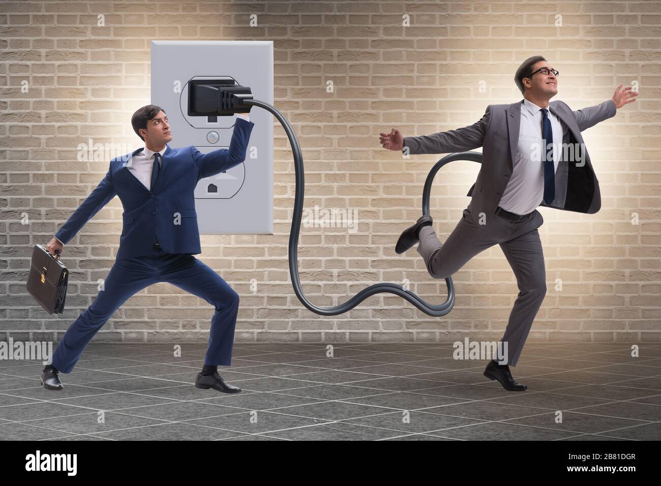 The businessman being powered by electricity and plug Stock Photo - Alamy