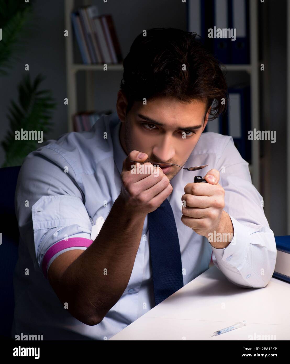 The employee relieving stress from overtime with drugs narcotics Stock ...