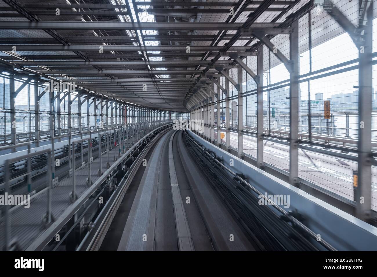 tunnel of monorail road view from front window of a moving train ...