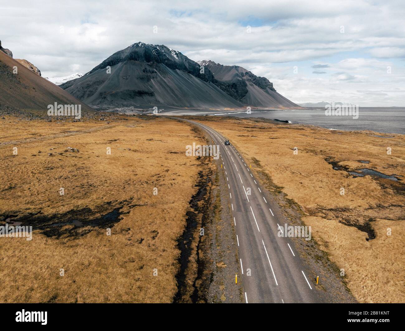 Aerial shot of Icelandic road through the Fjords in Autumn with ...
