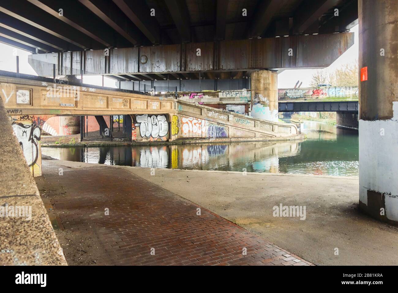 The urban canal below Spaghetti Junction in Birmingham UK Stock Photo ...