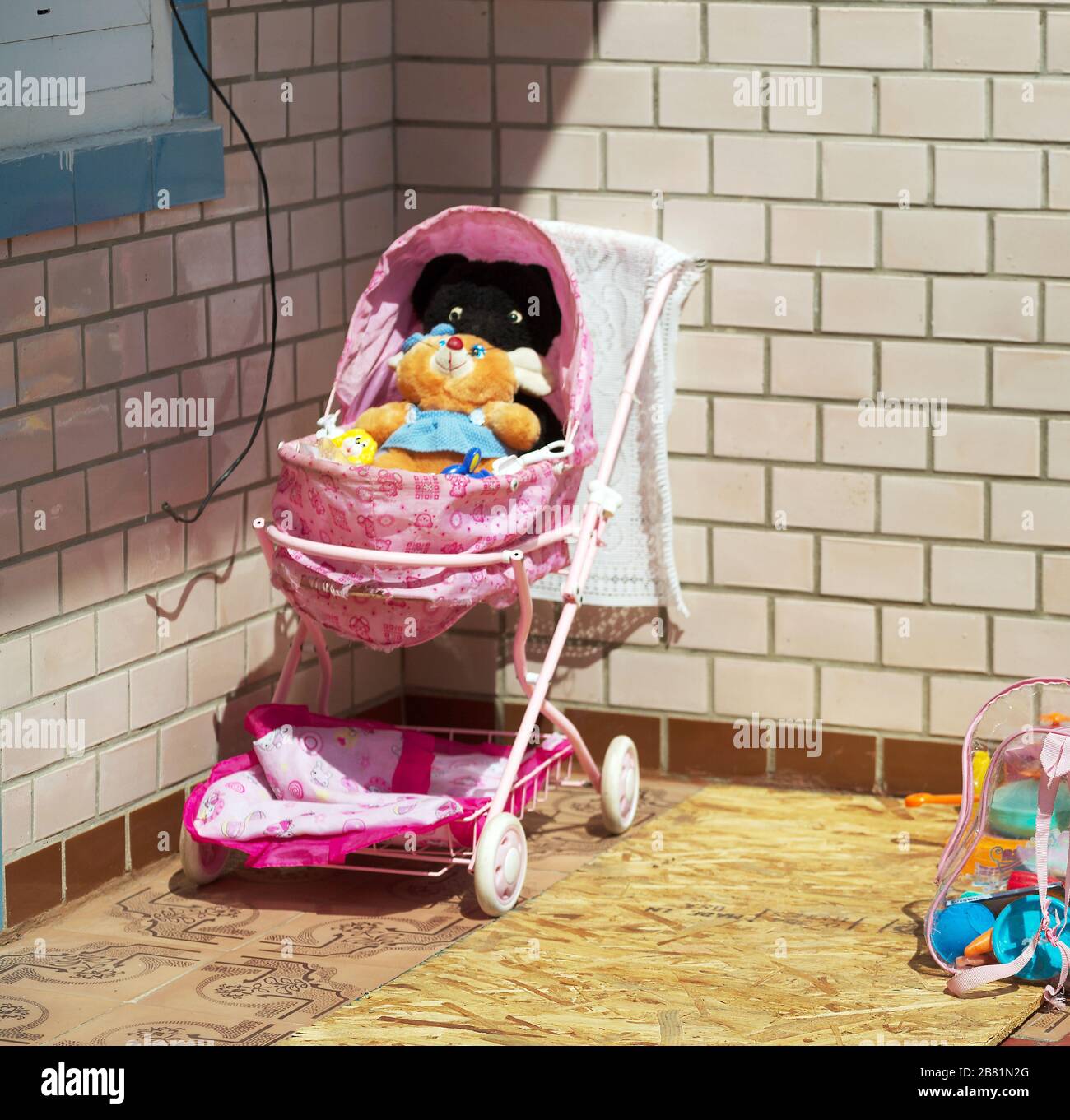 Boy doll stroller hi-res stock photography and images - Alamy