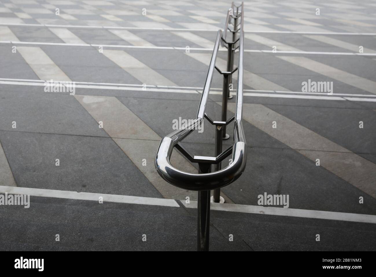 Shiny chrome metal fencing and railings Stock Photo - Alamy