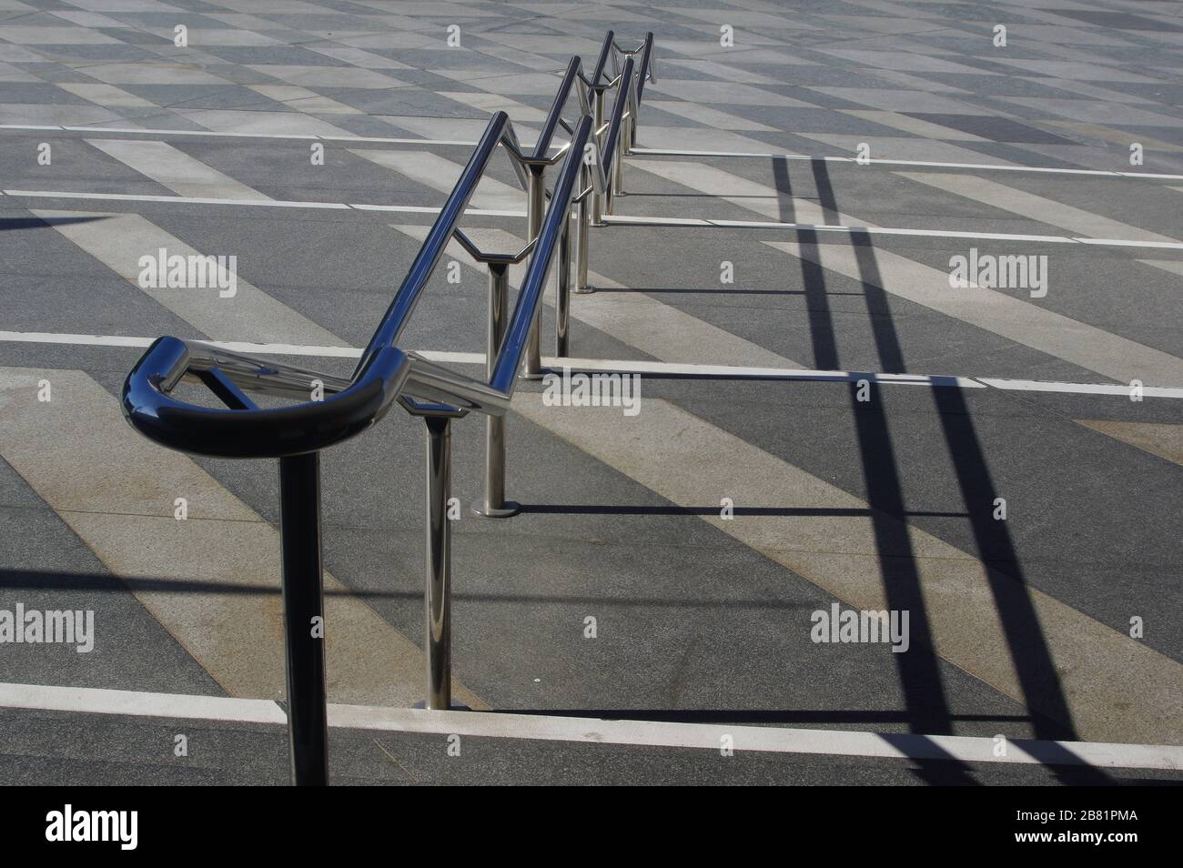 Shiny chrome metal fencing and railings Stock Photo - Alamy
