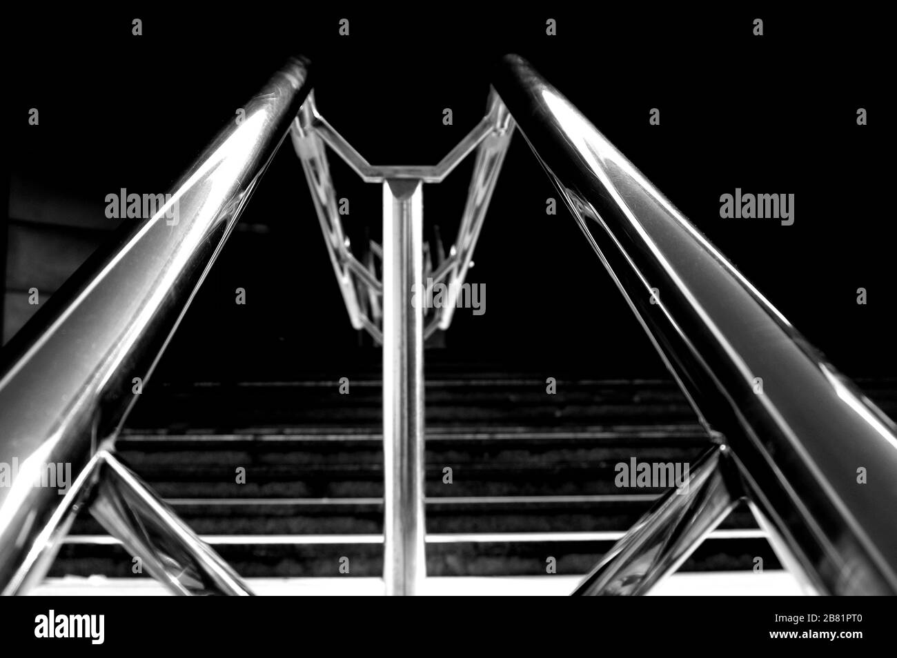 Shiny chrome metal fencing and railings Stock Photo - Alamy