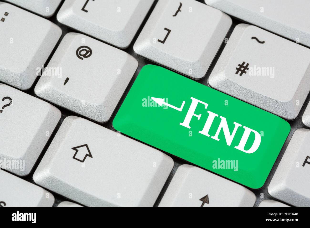 A keyboard with the word Find written in white lettering a green enter ...