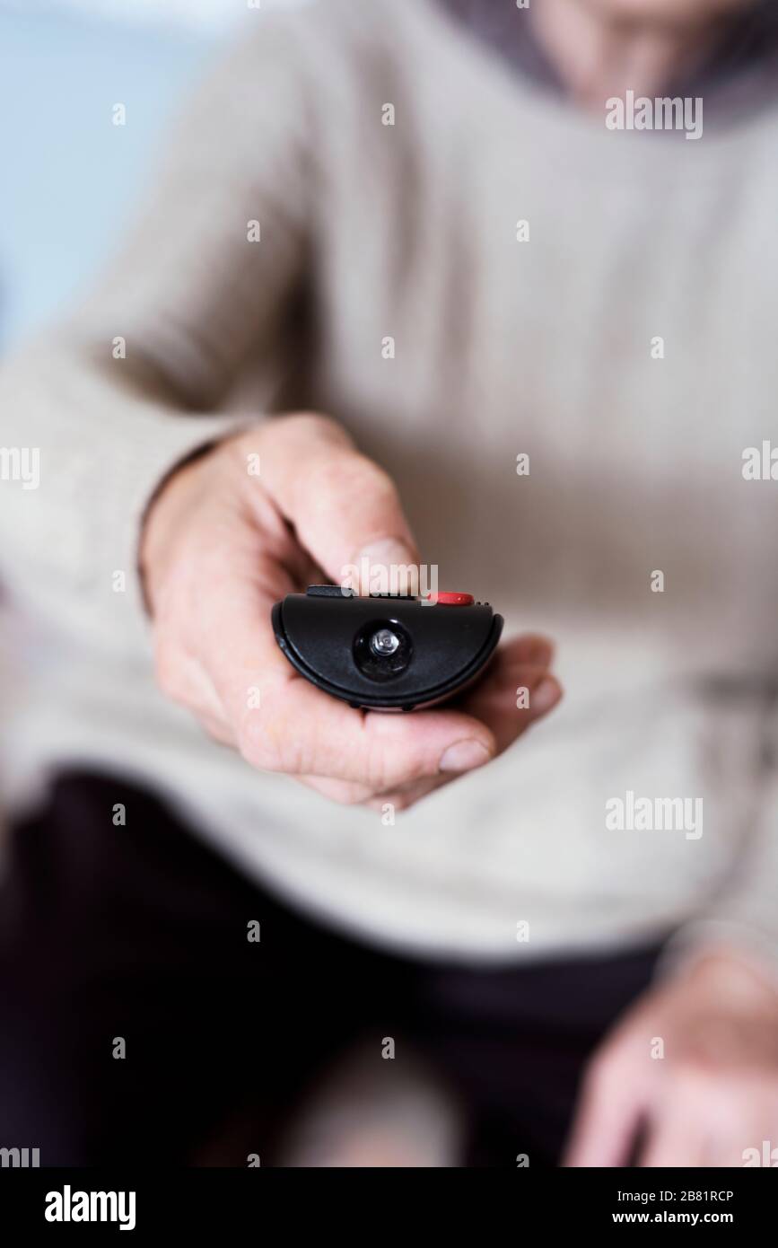 Grandma sitting on couch in hi-res stock photography and images - Alamy