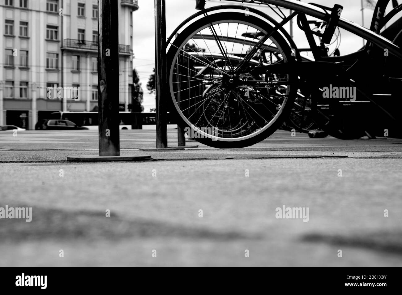 Bicycle locked to a cycle rack on a street Stock Photo - Alamy