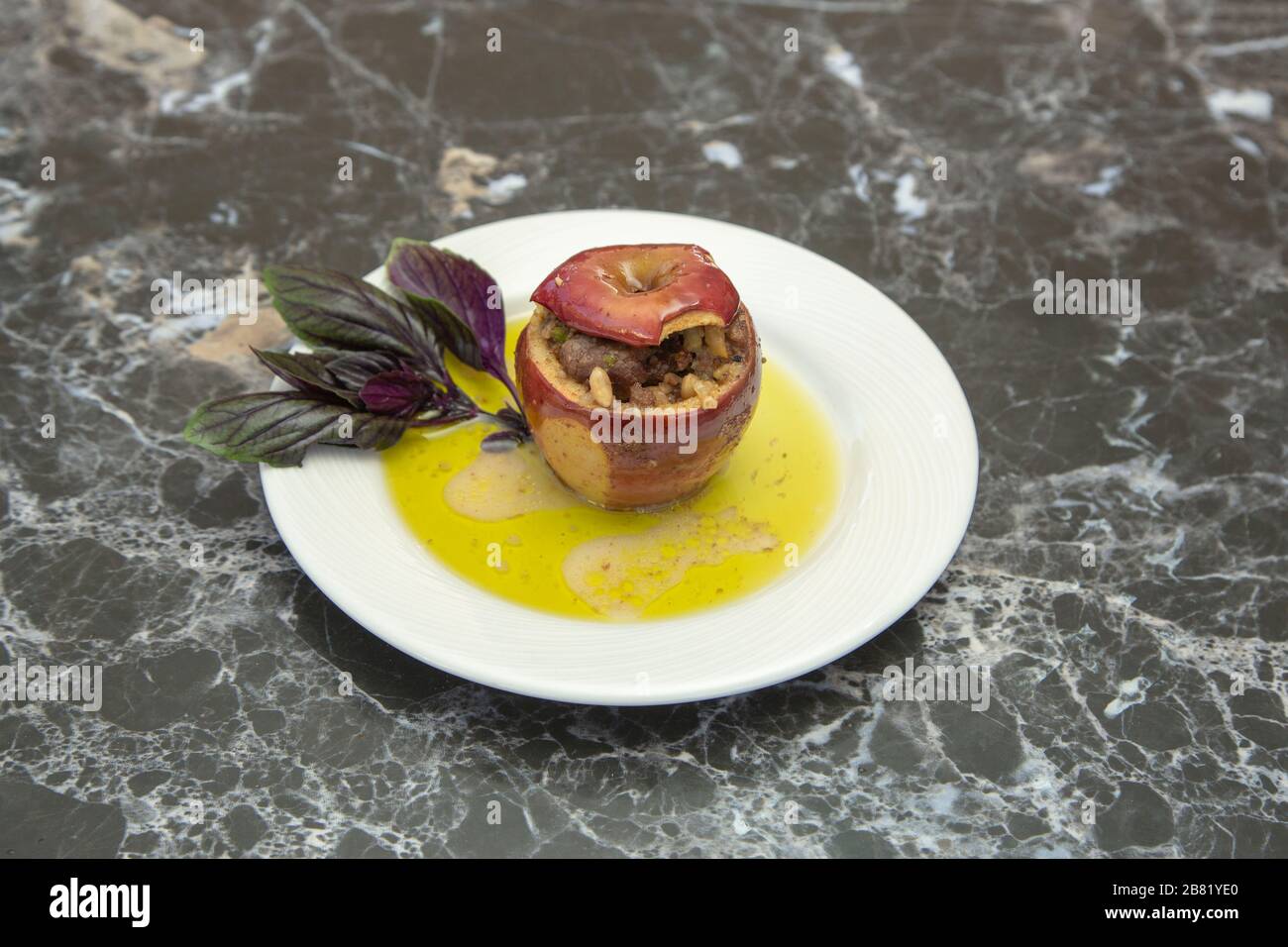 apple meal stuffed with minced meat Stock Photo - Alamy