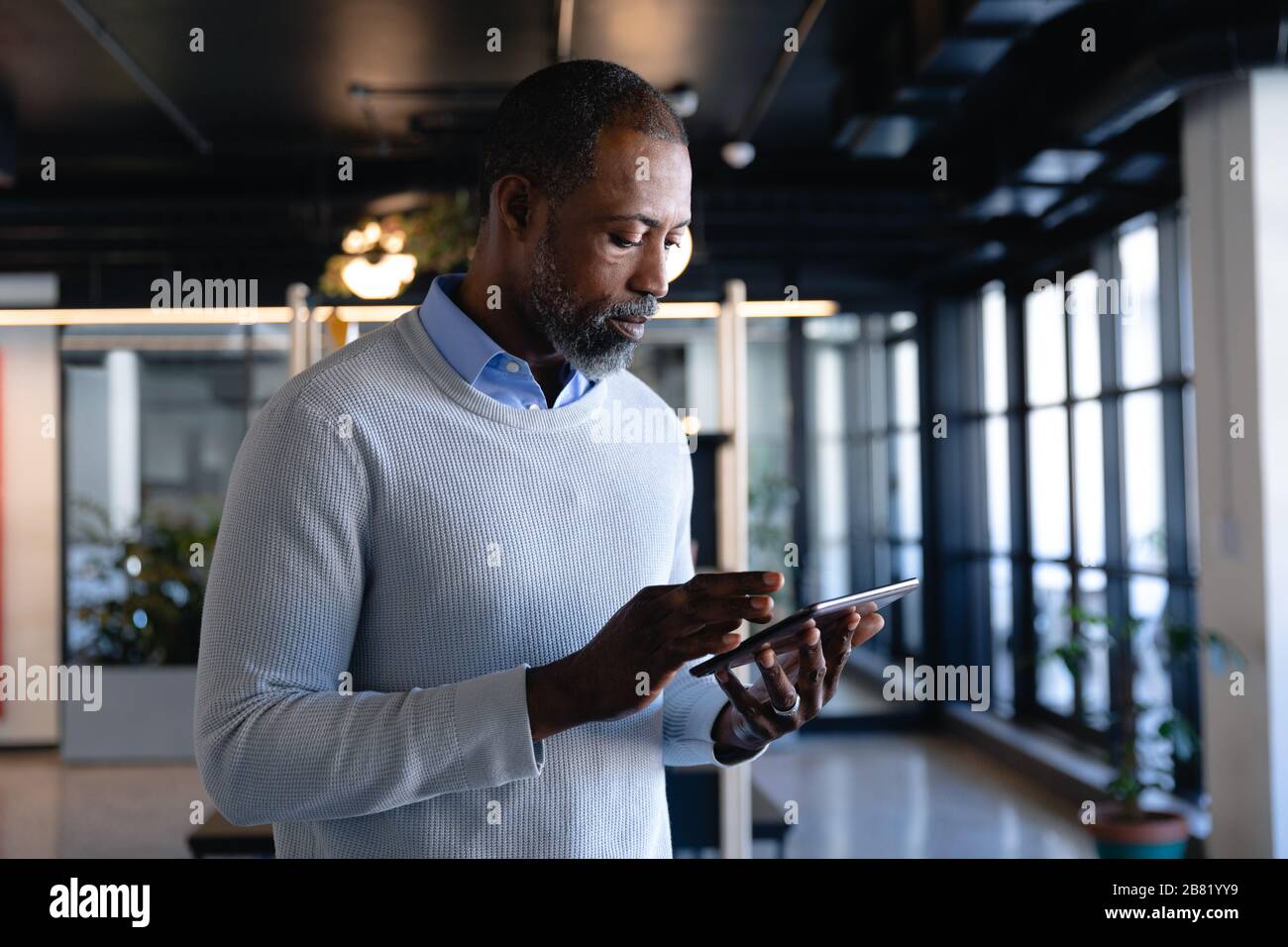 African businessman touching new hi-res stock photography and images ...