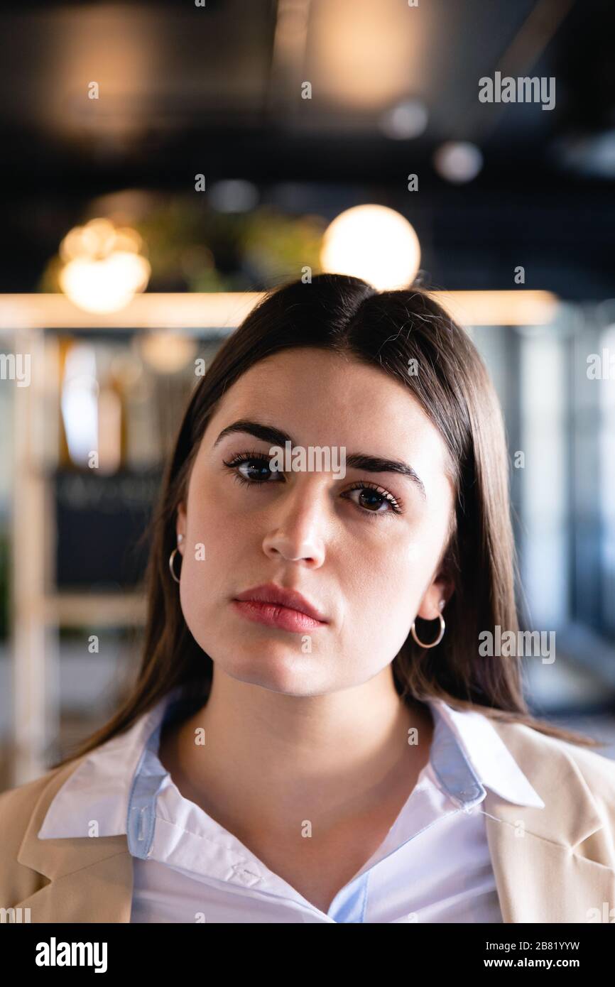 Woman looking down camera hi-res stock photography and images - Alamy