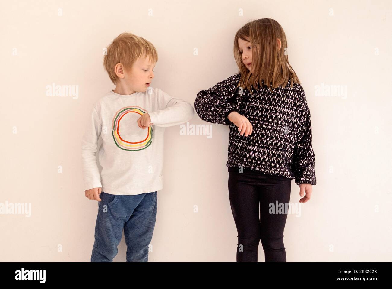 Elbow bump hi-res stock photography and images - Alamy