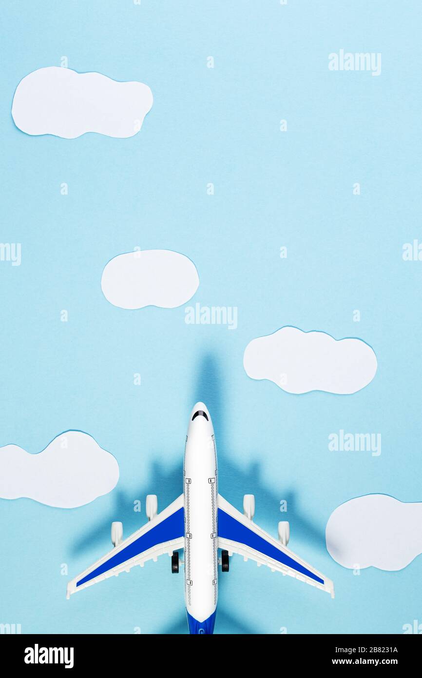 Model plane, airplane on blue pastel color background. Summer travel or ...
