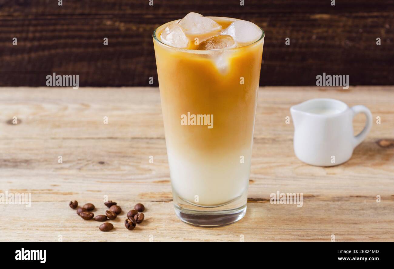 ice latte on wood background 2 Stock Photo - Alamy