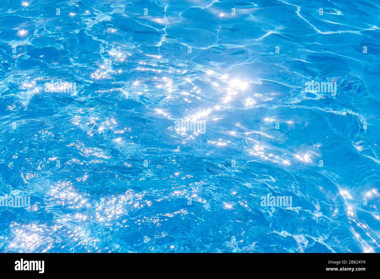 surface of blue swimming pool,background of water in swimming pool ...