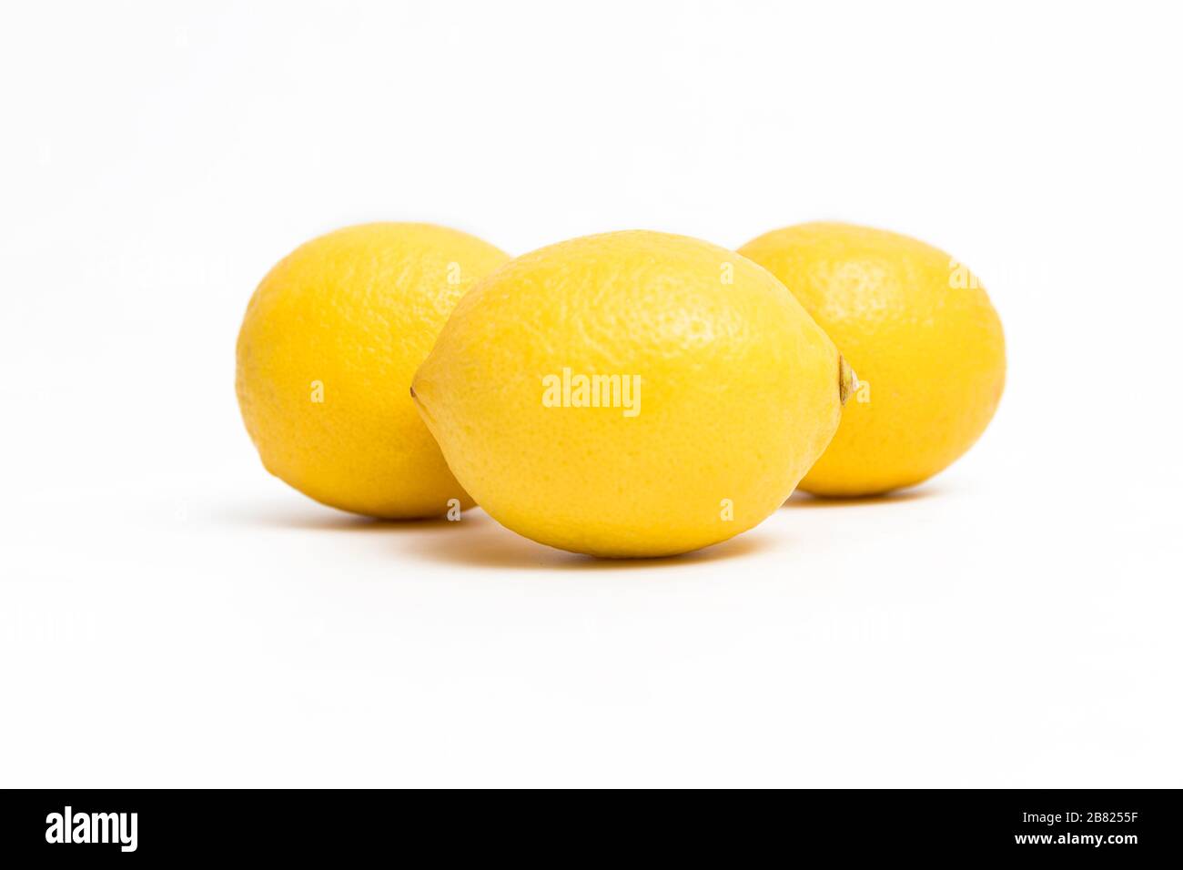 Fresh yellow lemons isolated on white backgrund Stock Photo - Alamy