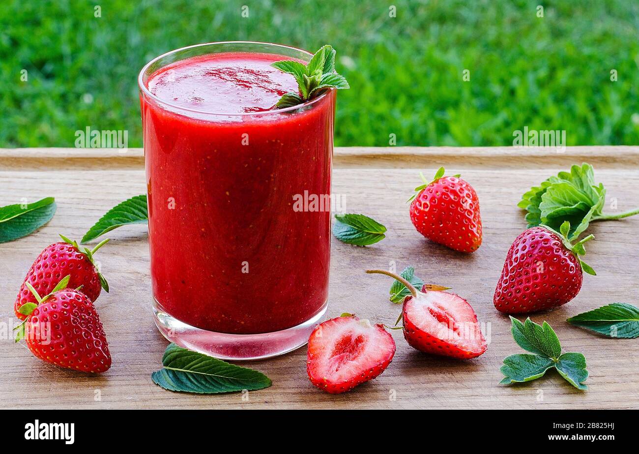 strawberry smoothies decorated with mint leaves2 Stock Photo - Alamy