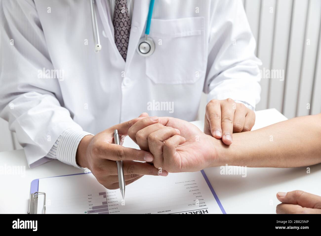 Doctor examining patient pulse by hands. Healthcare and medical service ...