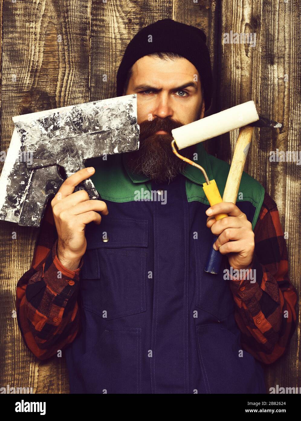 bearded builder man, long beard, brutal caucasian hipster with ...