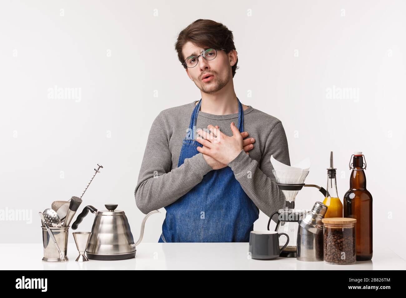 Barista, cafe worker and bartender concept. Portrait of touched ...