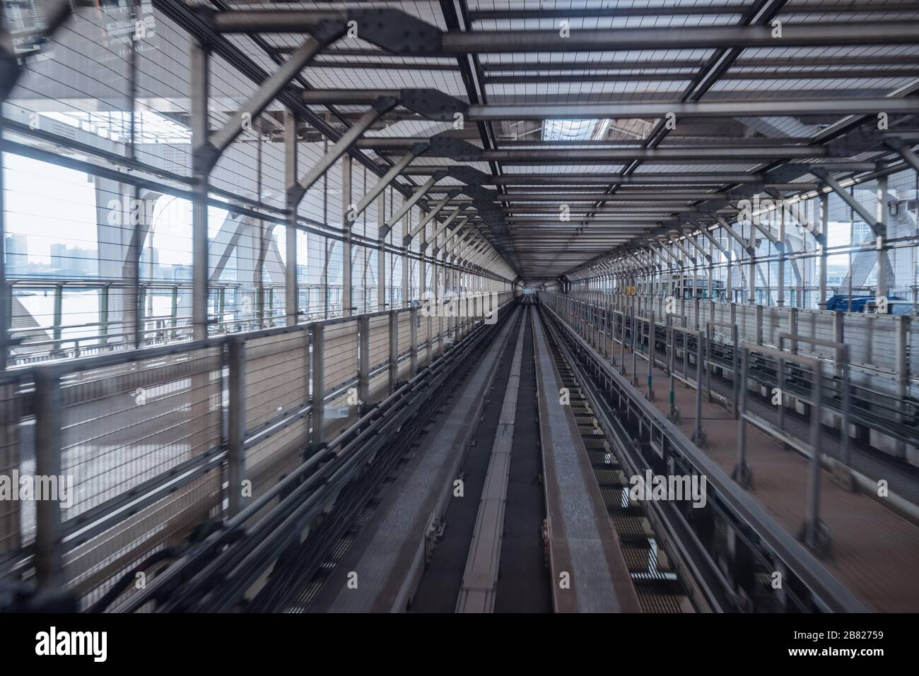 tunnel of monorail road view from front window of a moving train ...