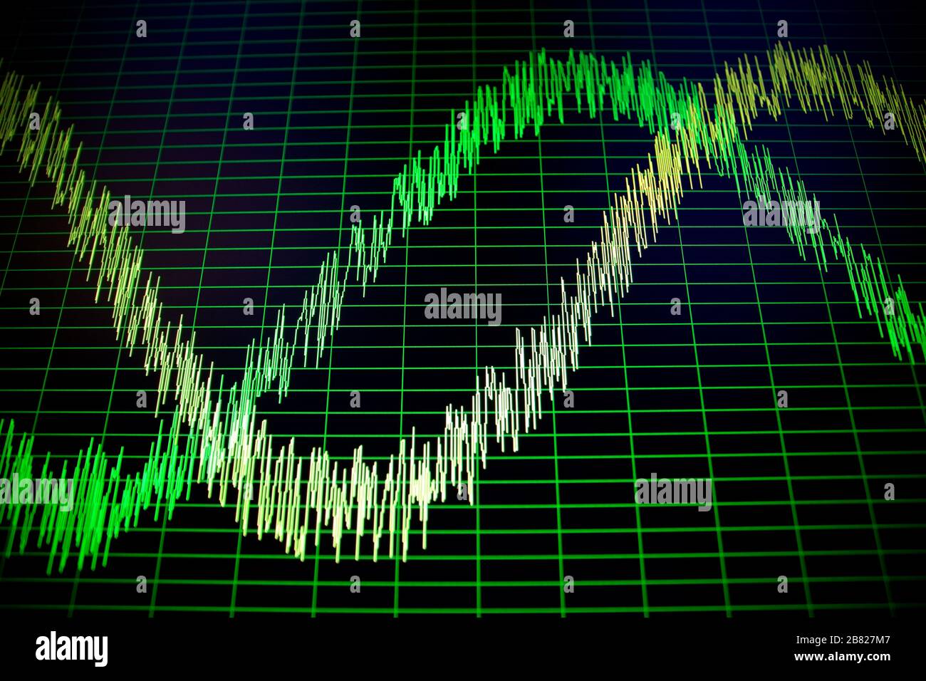 Green and yellow waveforms and spectograms on computer screen in ...