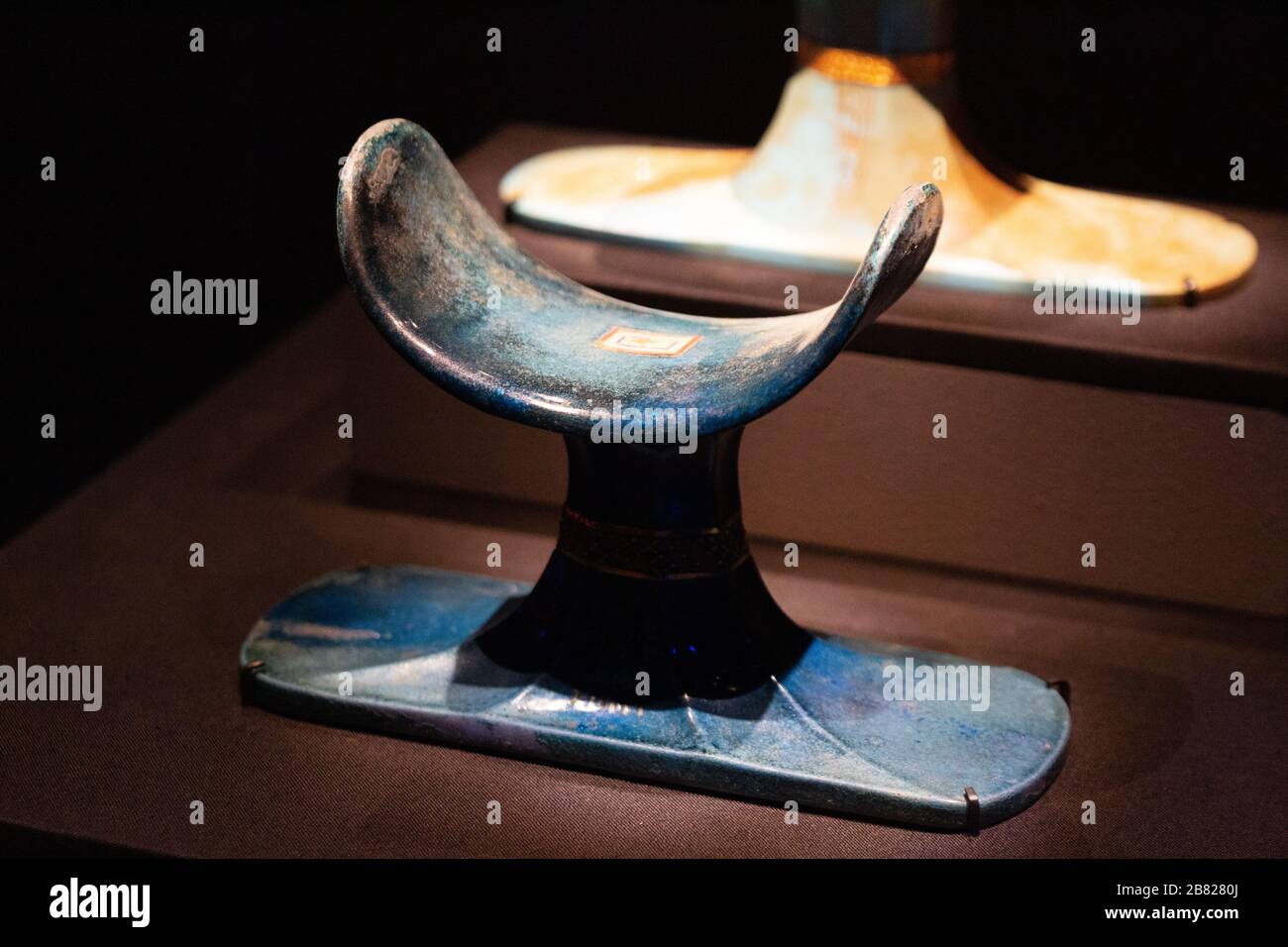 Tutankhamun tomb treasures; Blue faience inscribed headrest from the ...