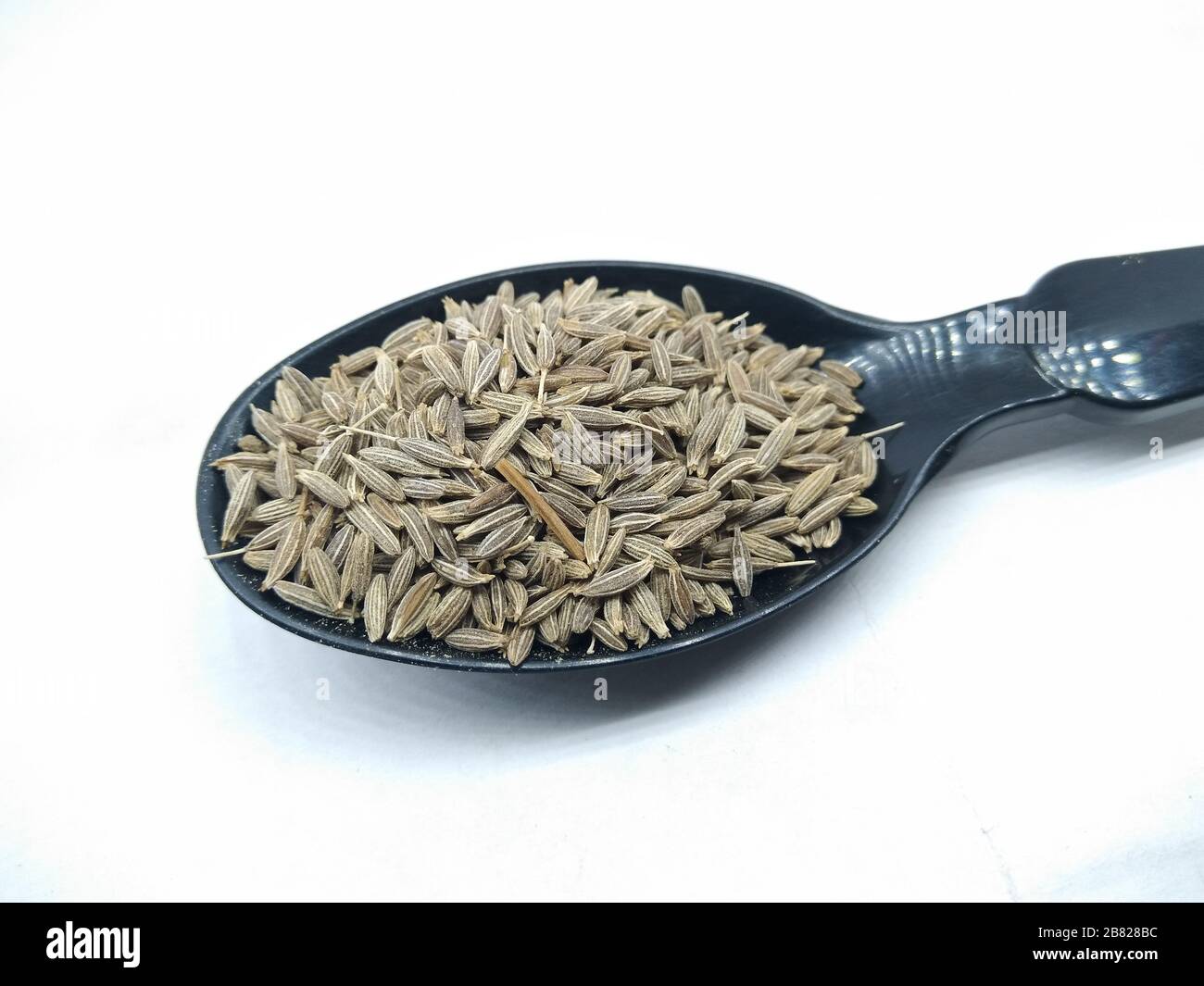 A picture of cumin seeds Stock Photo - Alamy