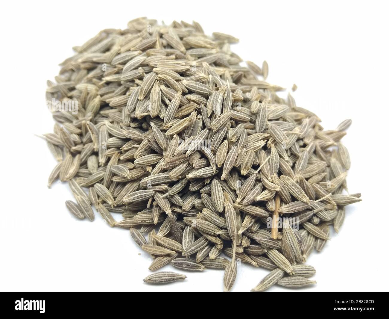 A picture of cumin seeds Stock Photo - Alamy
