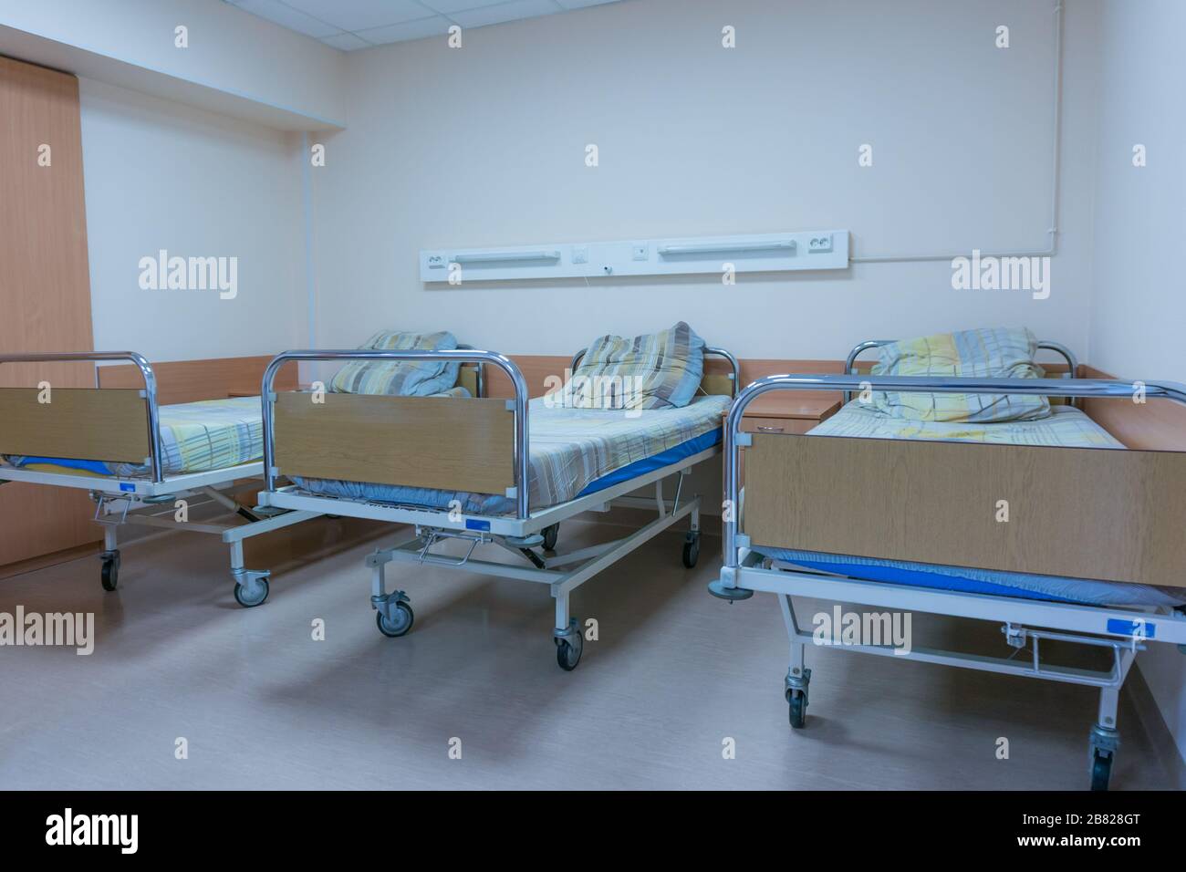 Empty beds in a hospital room. The hospital is ready to receive ...