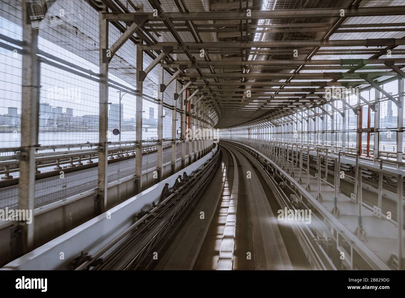 tunnel of monorail road view from front window of a moving train ...