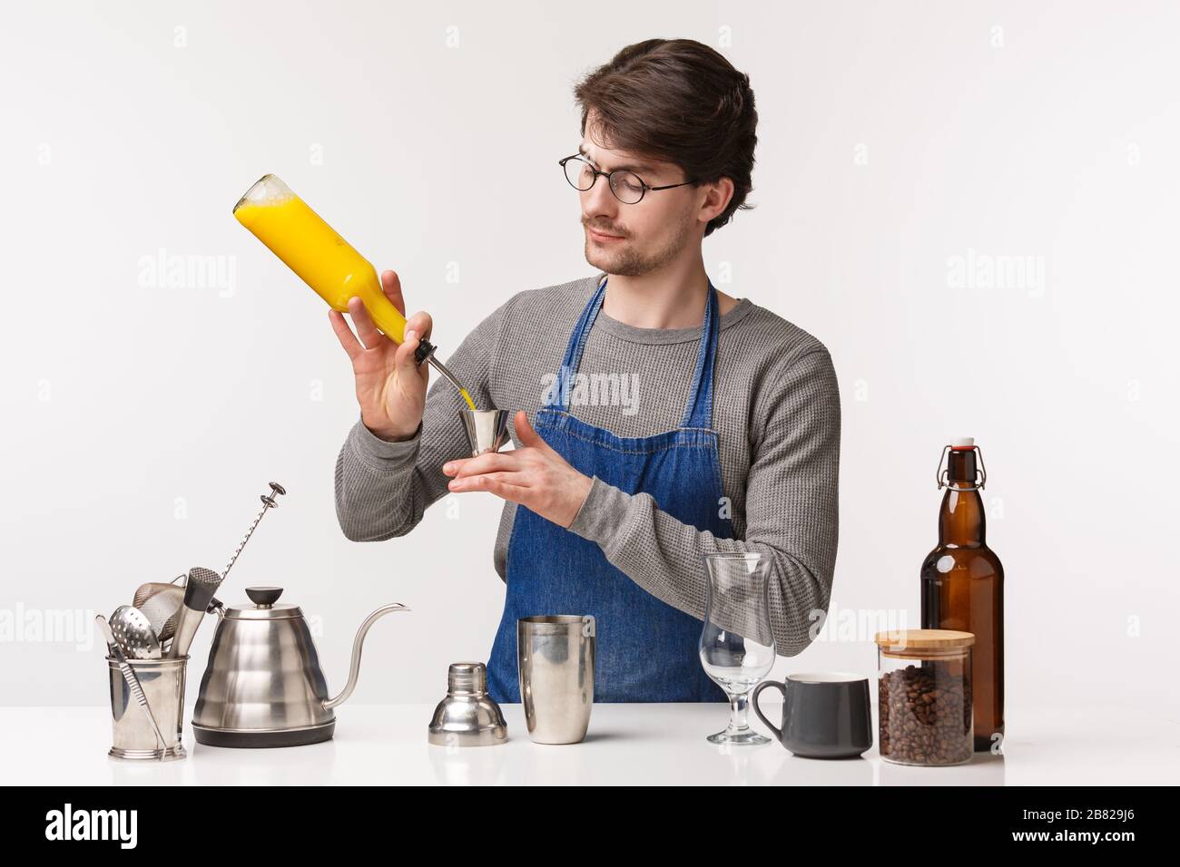 Barista, cafe worker and bartender concept. Portrait of serious-looking ...