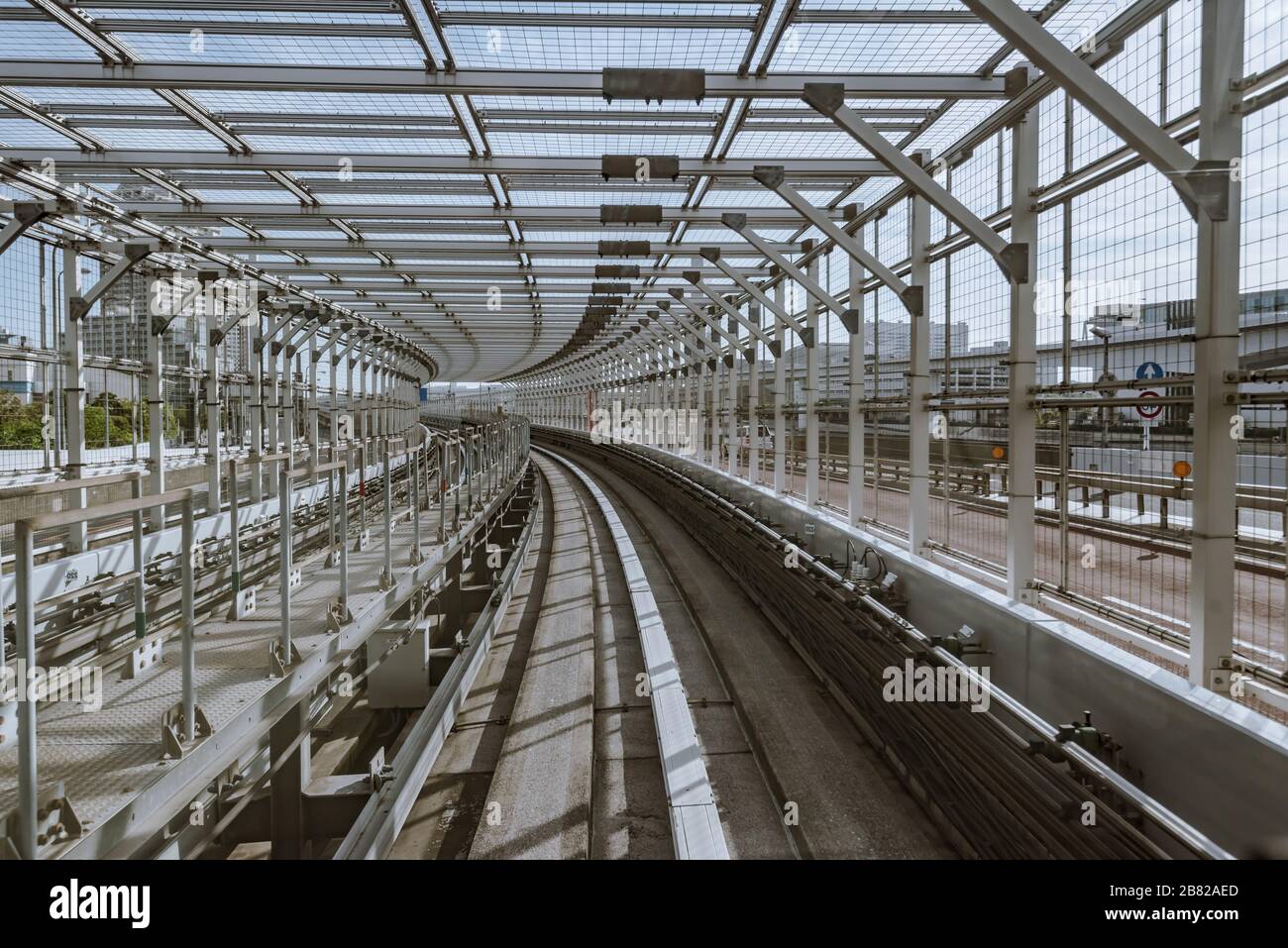 tunnel of monorail road view from front window of a moving train ...