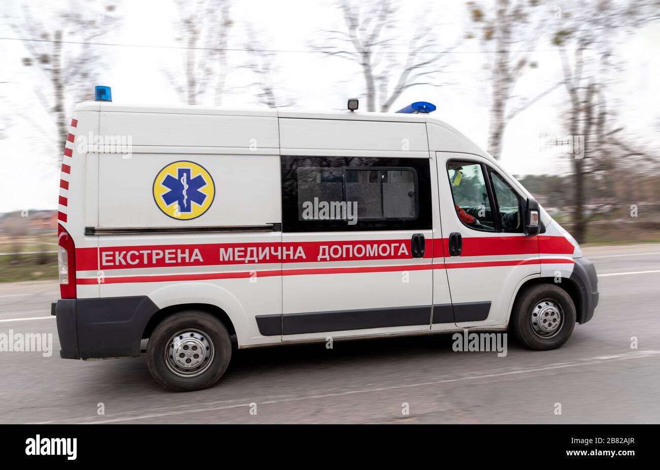 Ukrainian ambulance on emergency car in motion blur Stock Photo - Alamy