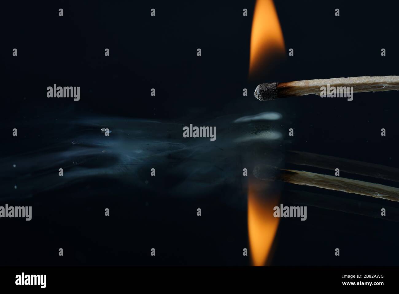 Lit matches and blown out in the studio photographed with colorful ...