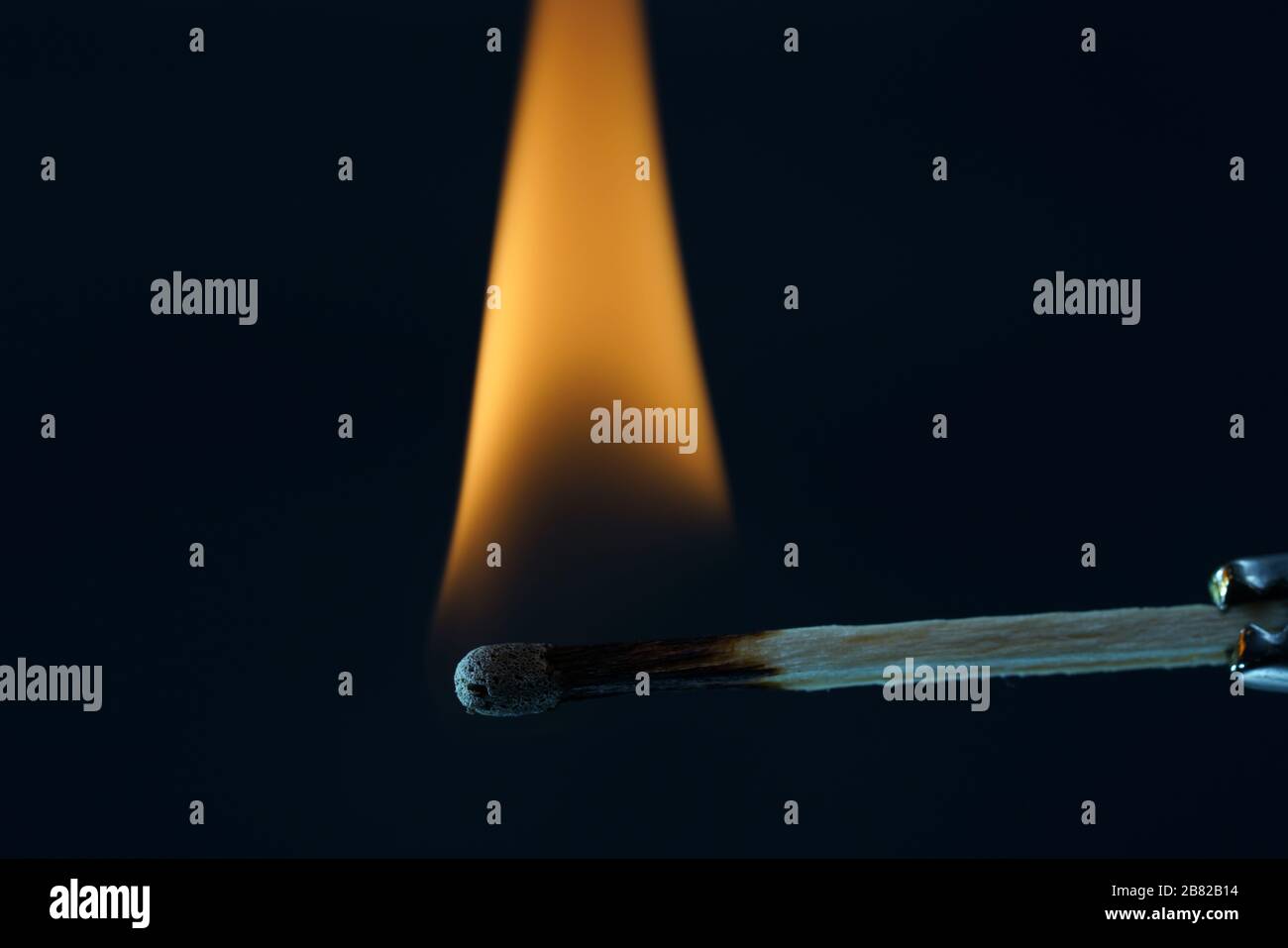 Lit matches and blown out in the studio photographed with colorful ...