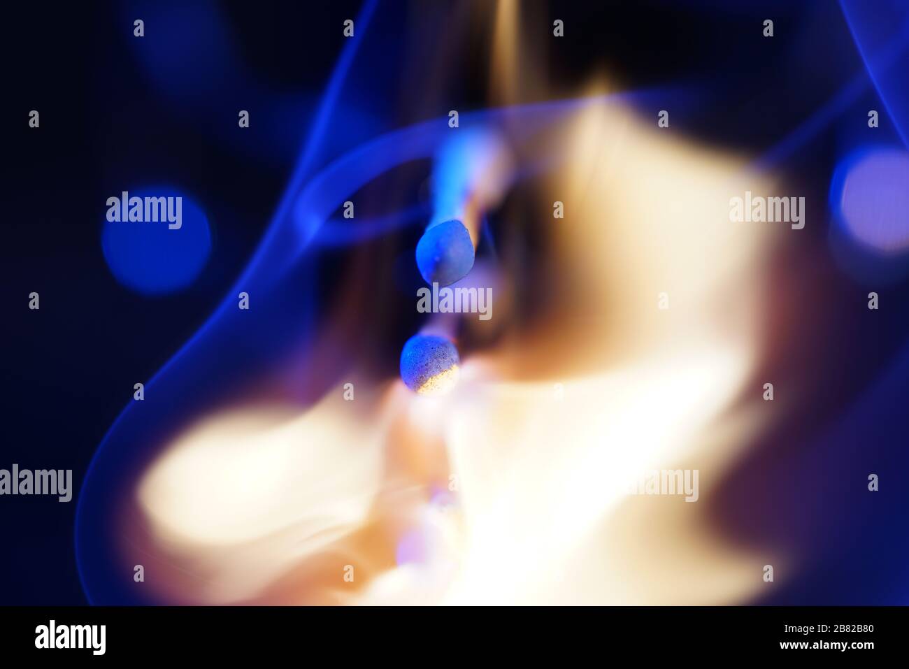 Lit matches and blown out in the studio photographed with colorful ...
