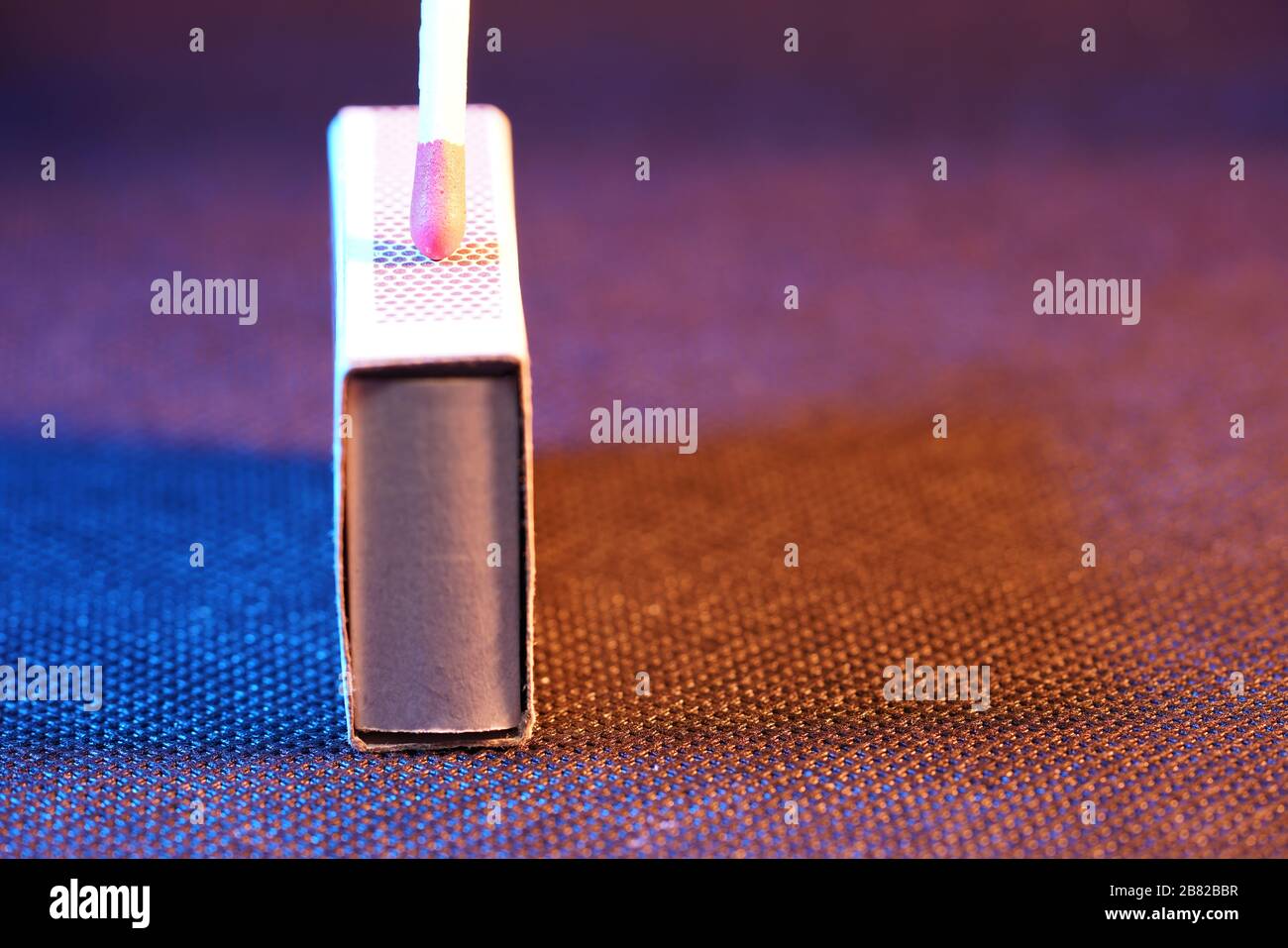 Lit matches and blown out in the studio photographed with colorful ...