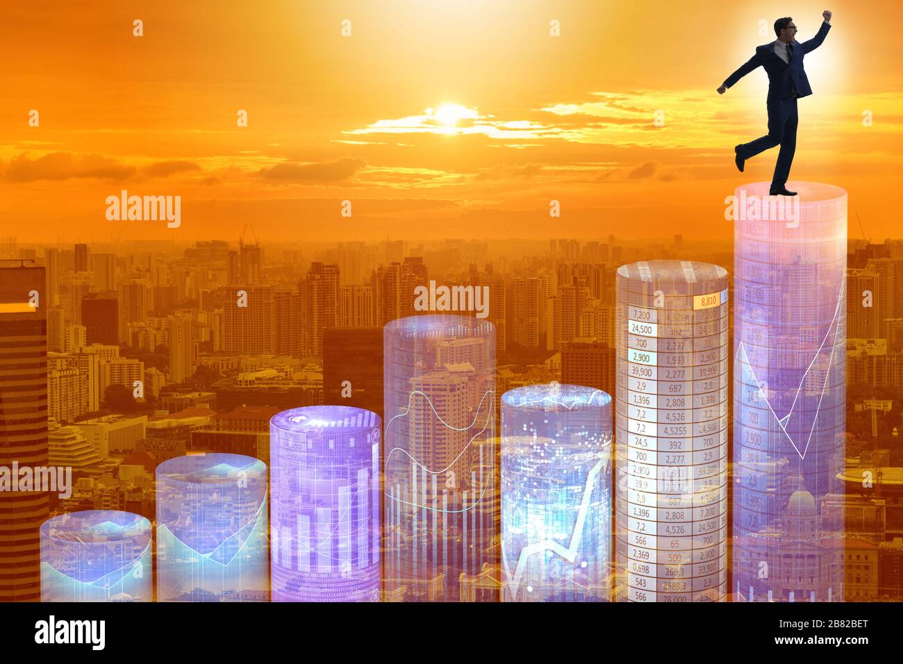 The businessman climbing bar charts in growth concept Stock Photo - Alamy