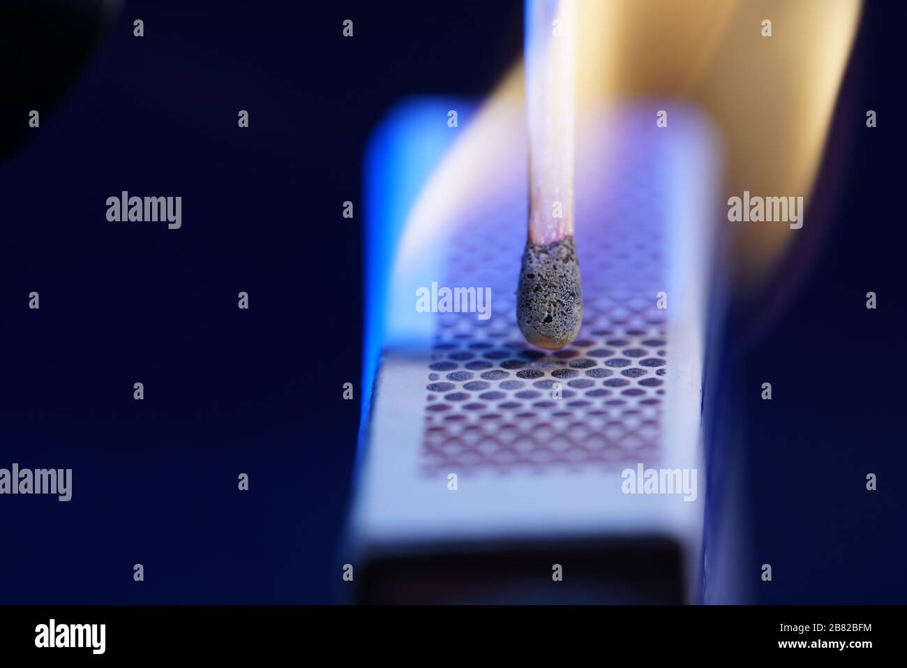 Lit matches and blown out in the studio photographed with colorful ...