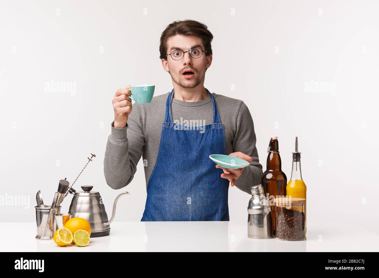 Barista, cafe worker and bartender concept. Portrait of confused and ...