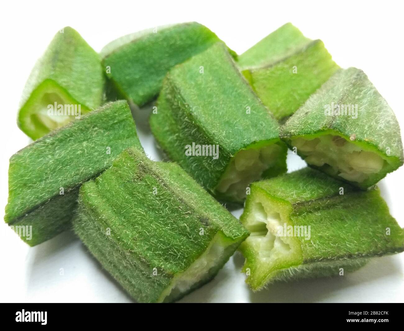 A picture of ladyfinger on white background Stock Photo - Alamy