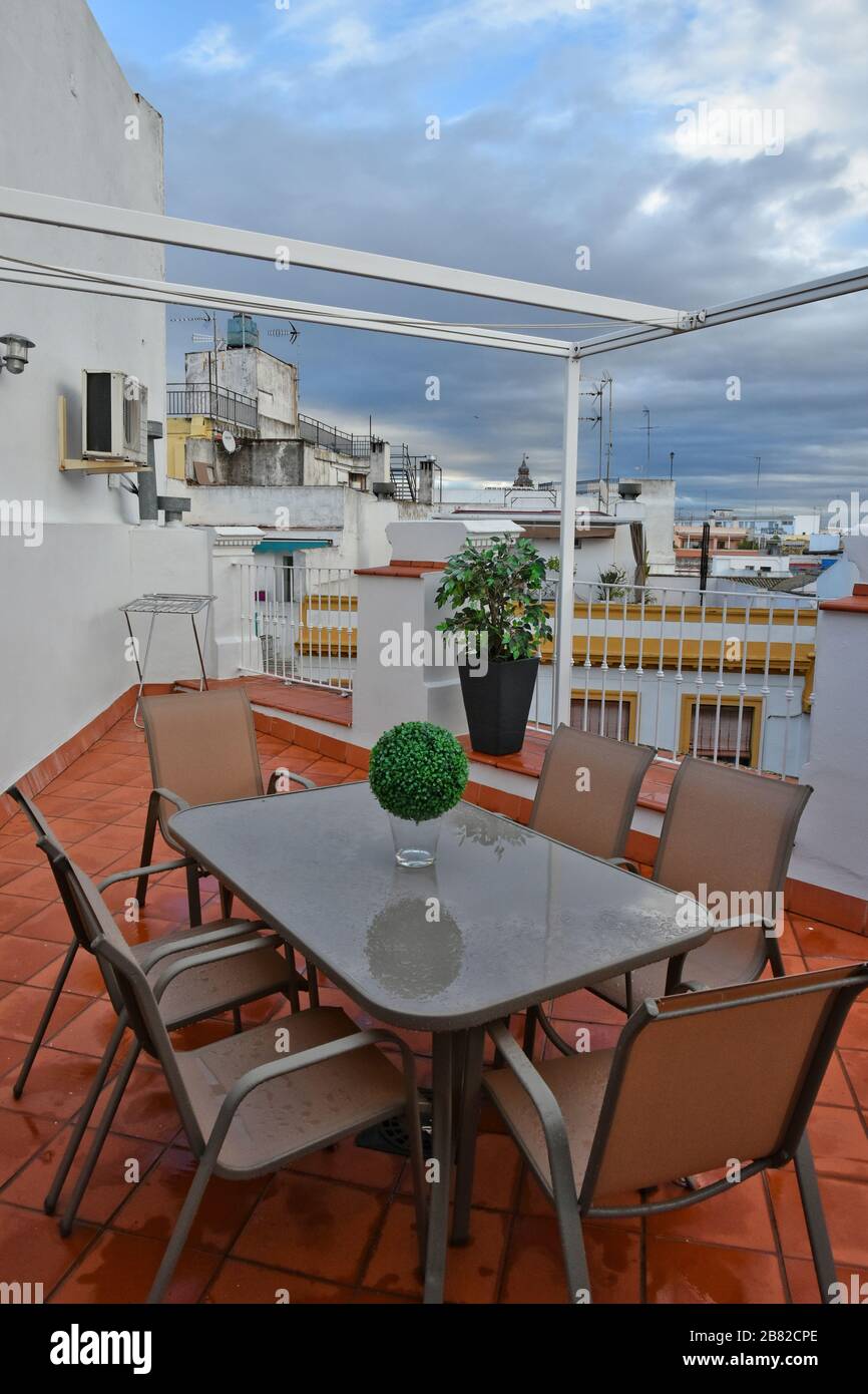 The terrace of a house in the historic center of the city, in Seville ...