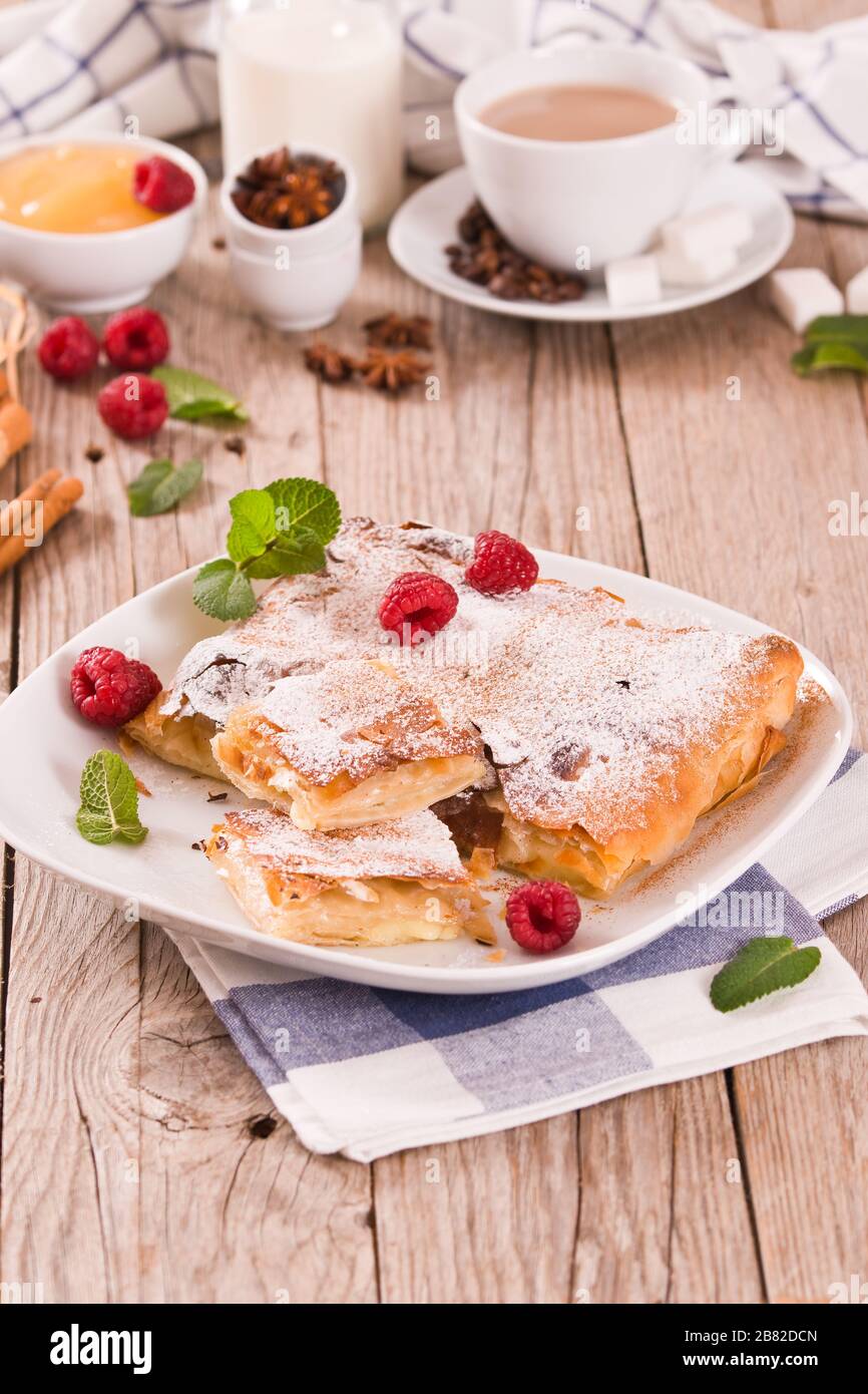 Bougatsa - Greek puff pastry with cream Stock Photo - Alamy