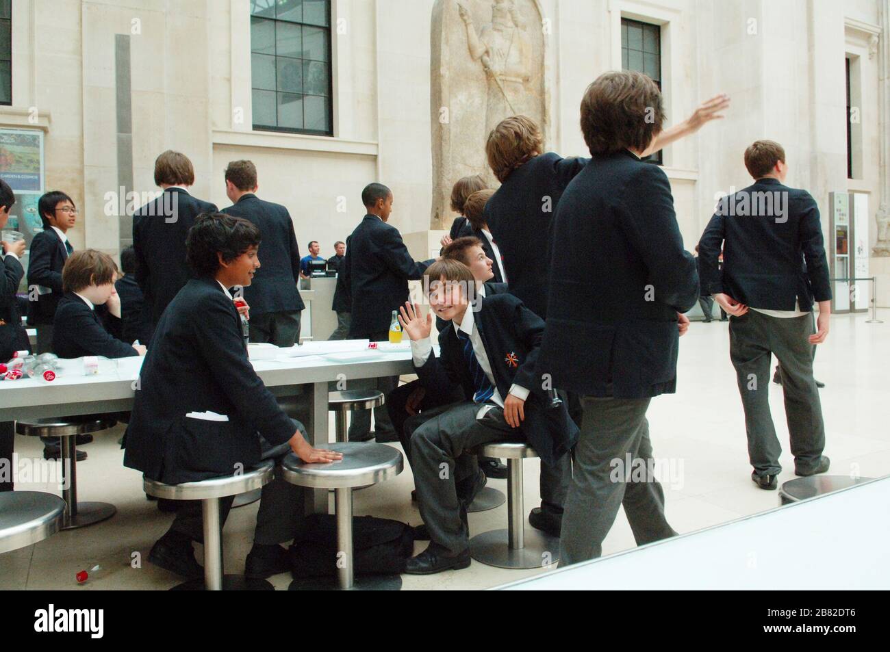 Lots of school children, school boys at the British museum, on a school ...