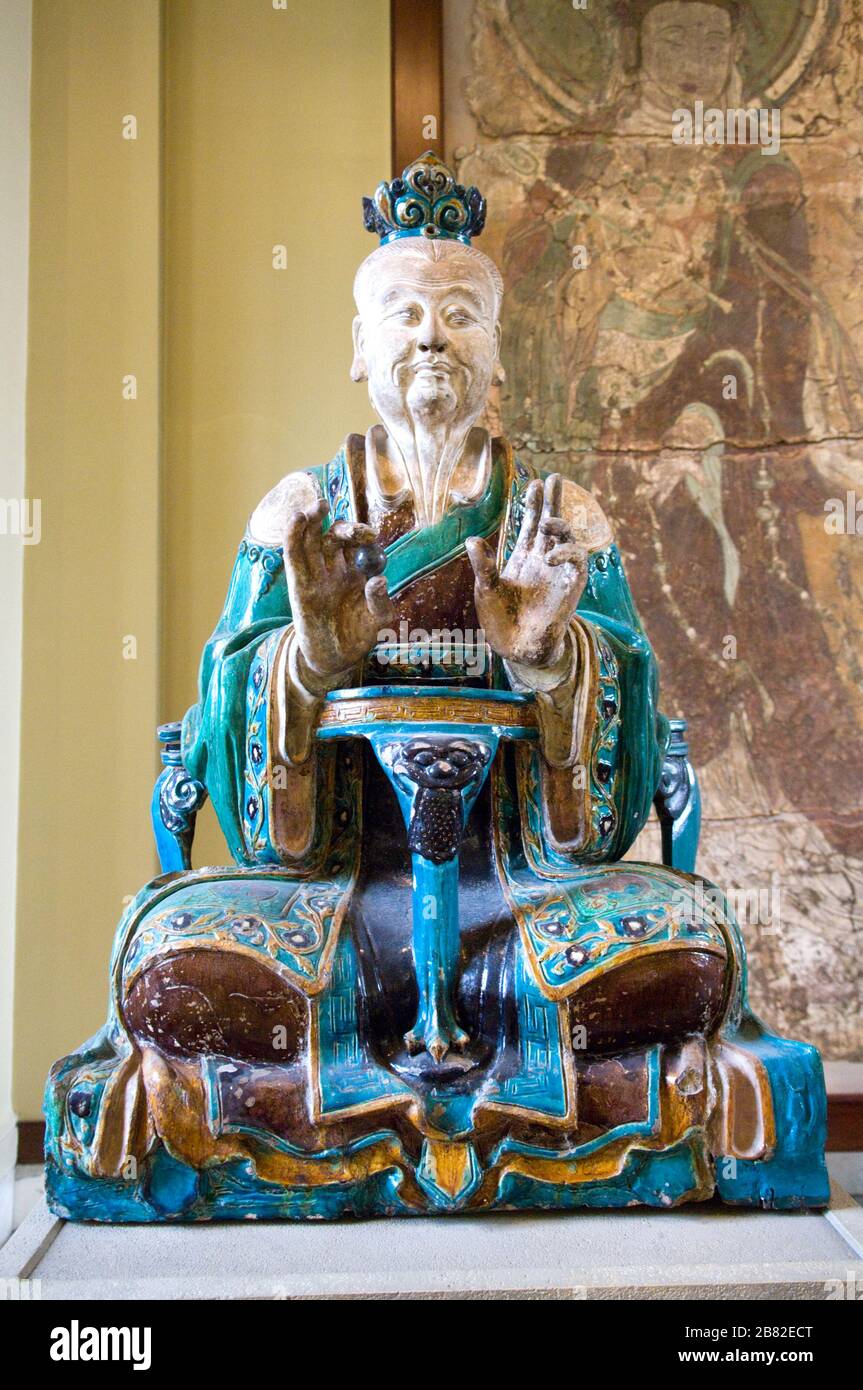A stoneware figure of a Daoist deity from the Ming Dynasty at the ...