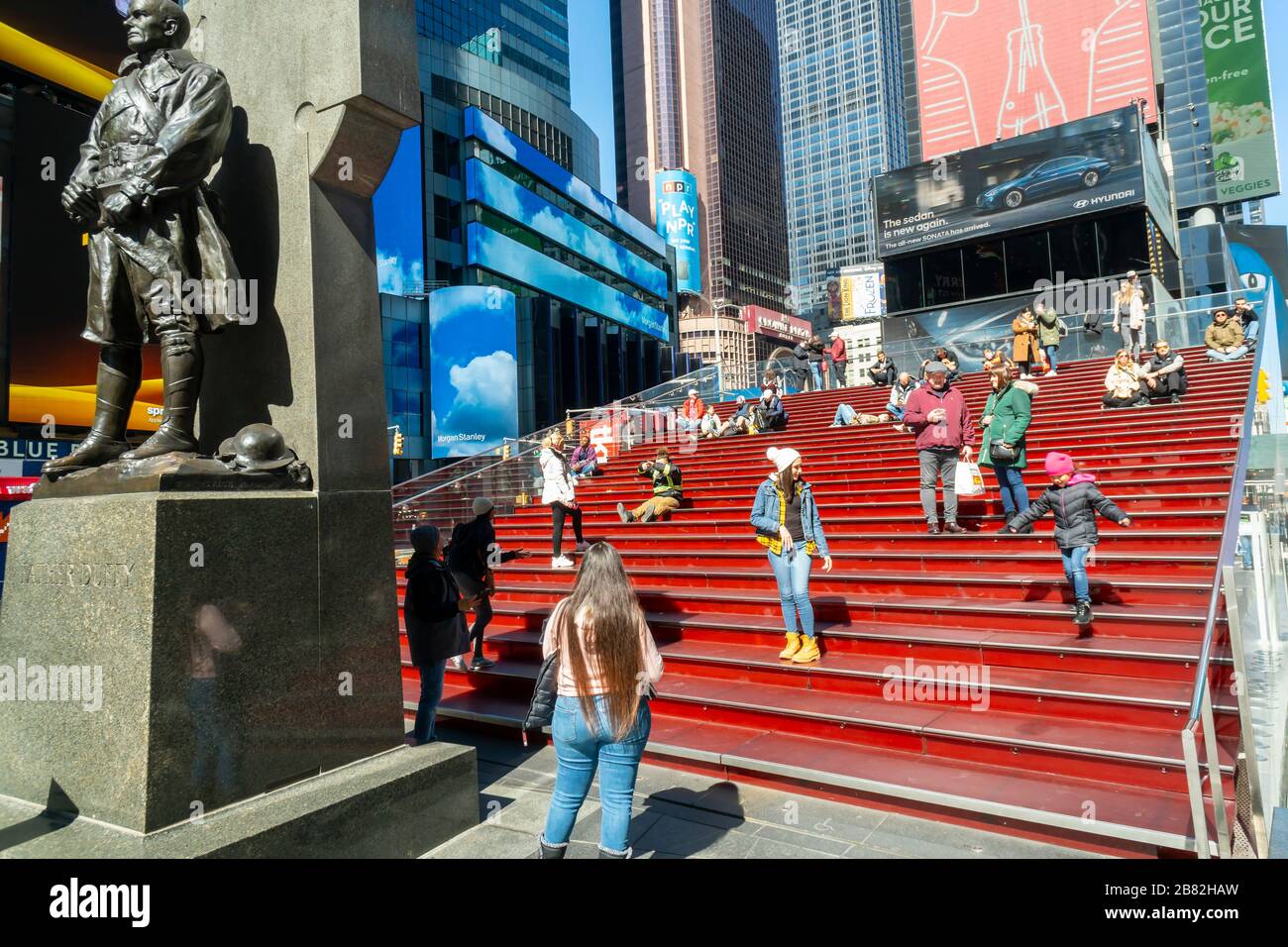 The red steps in Times Square in New York is unusually uncrowded due to ...