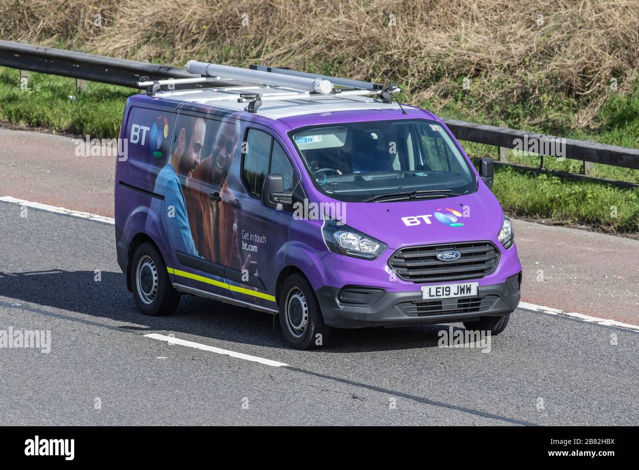 BT purple livery Ford van; UK vehicular traffic, transport, moving ...