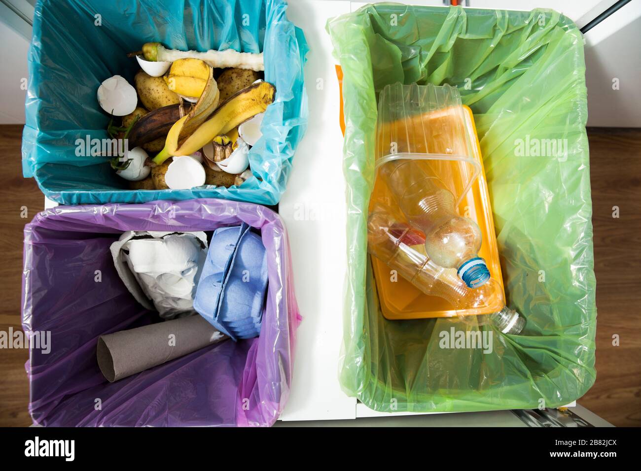 Garbage cans flat top view. Three trash bins with sorted garbage in ...